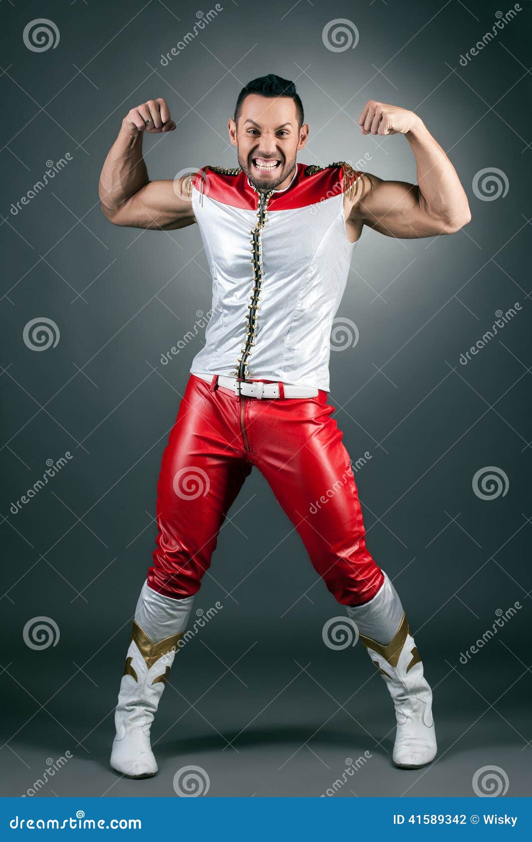 Cheerful Muscular Dancer Shows Biceps at Camera Stock Photo - Image of ...
