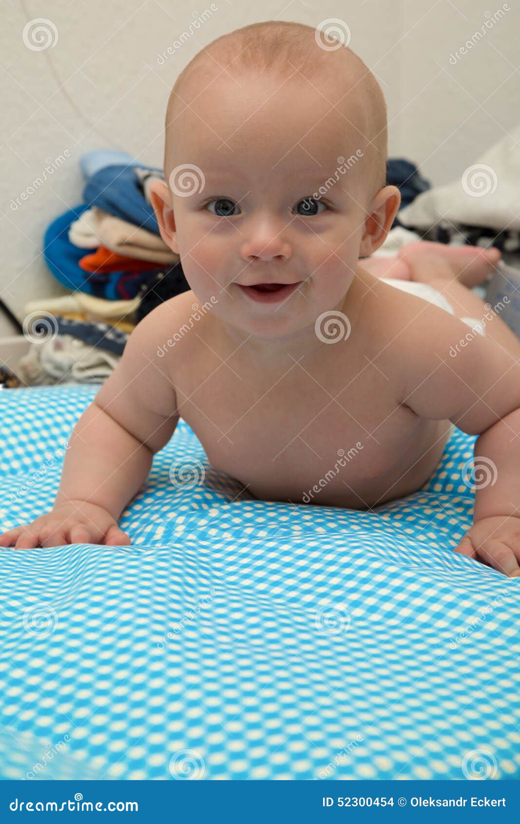 Cheerful Newborn Playing on the Diaper Table Stock Photo - Image of ...