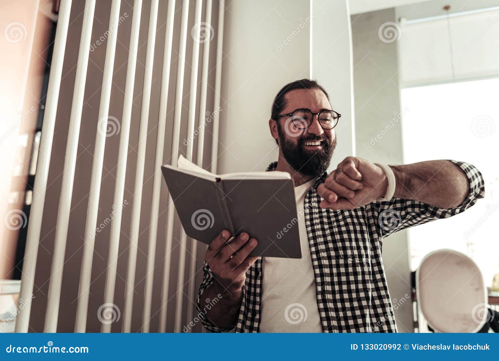 Cheerful Nice Man Looking at the Time Stock Photo - Image of appoinment ...