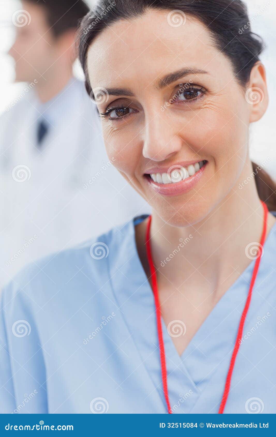 Cheerful Nurse Smiling at Camera Stock Photo - Image of friendly ...