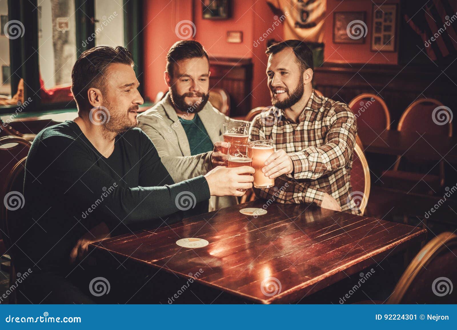 Cheerful Old Friends Having Fun and Drinking Draft Beer in Pub. Stock ...