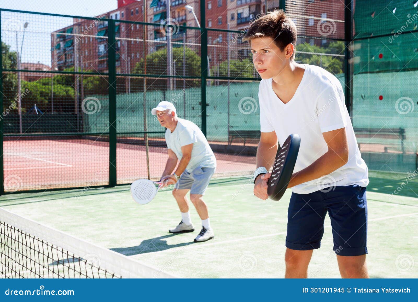 Padel Players Of Different Generations Posing On Padel Court Stock ...