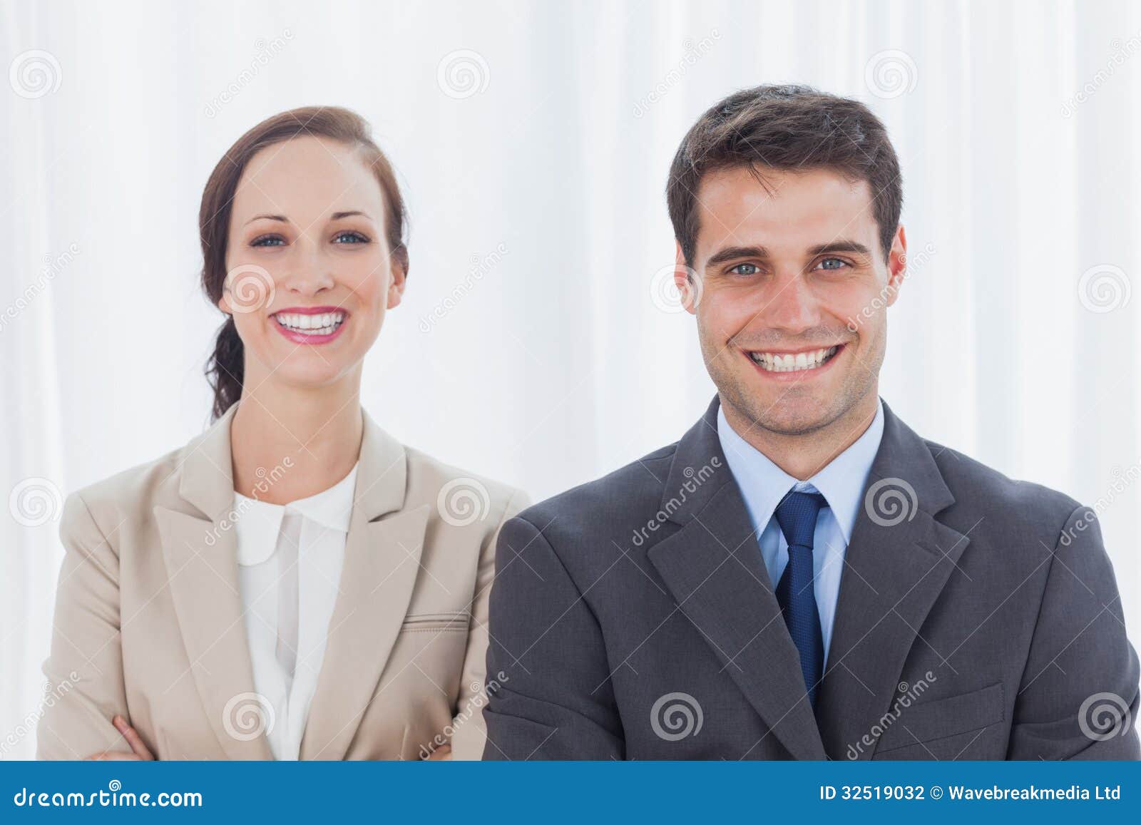 Cheerful Partners Posing Together Looking at Camera Stock Photo - Image ...
