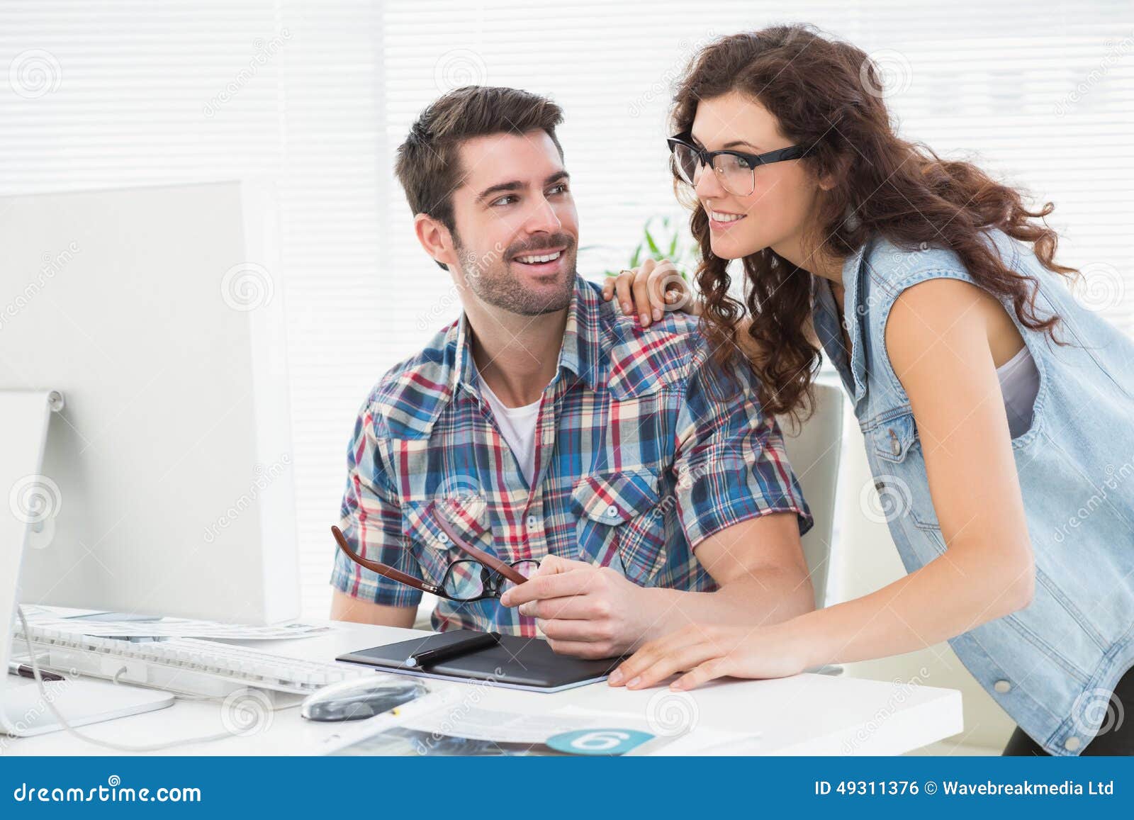 Cheerful Partners Using Computer Together Stock Photo - Image of ...