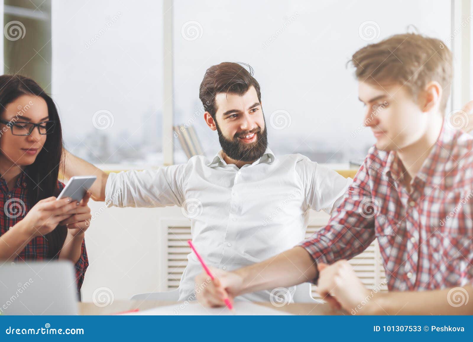 Cheerful People Doing Paperwork and Using Devices Stock Image - Image ...