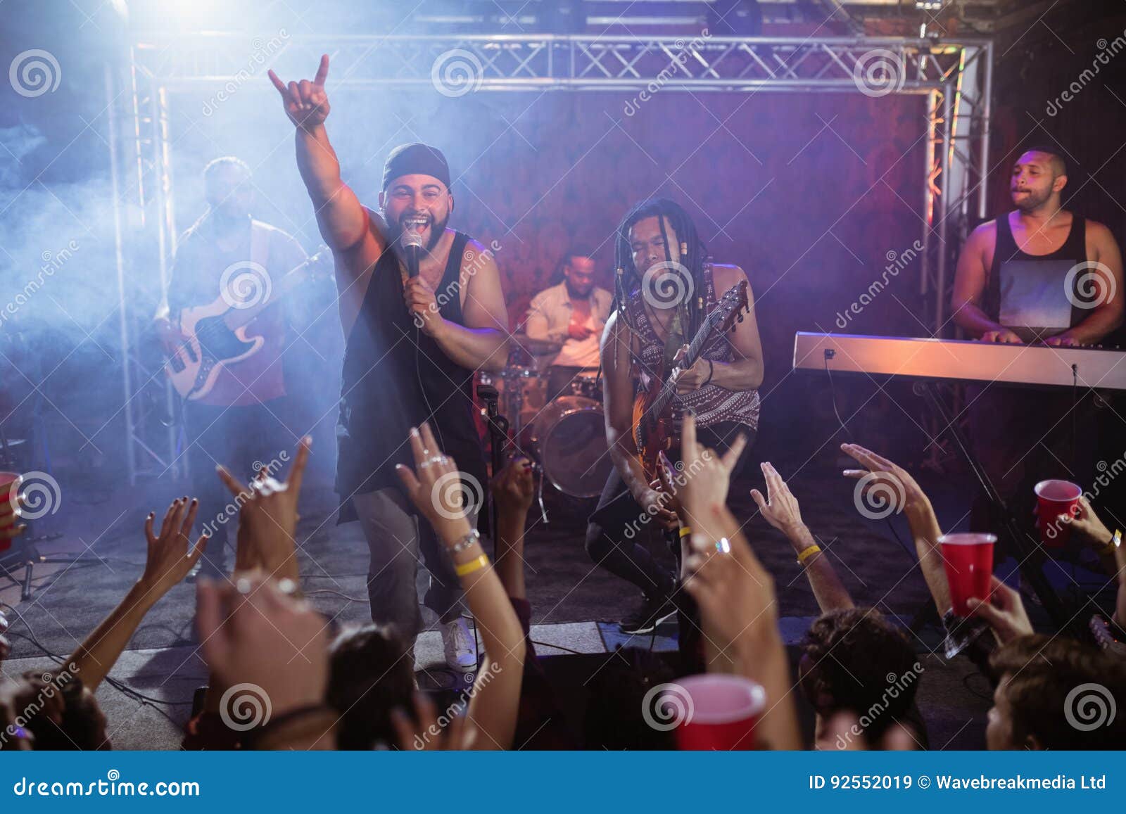 Cheerful Performance Group at Nightclub Stock Image - Image of enjoying ...