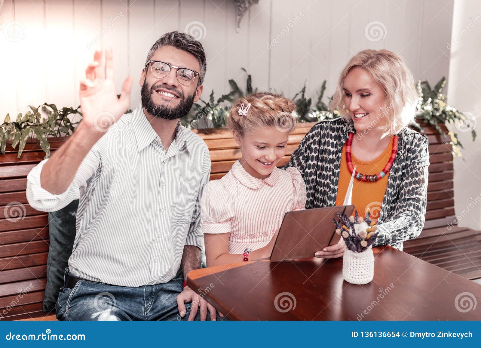 Cheerful Positive Man Asking the Waitress To Come Stock Photo - Image ... Cheerful Positive Man Asking the Waitress To Come Stock Photo - Image ...