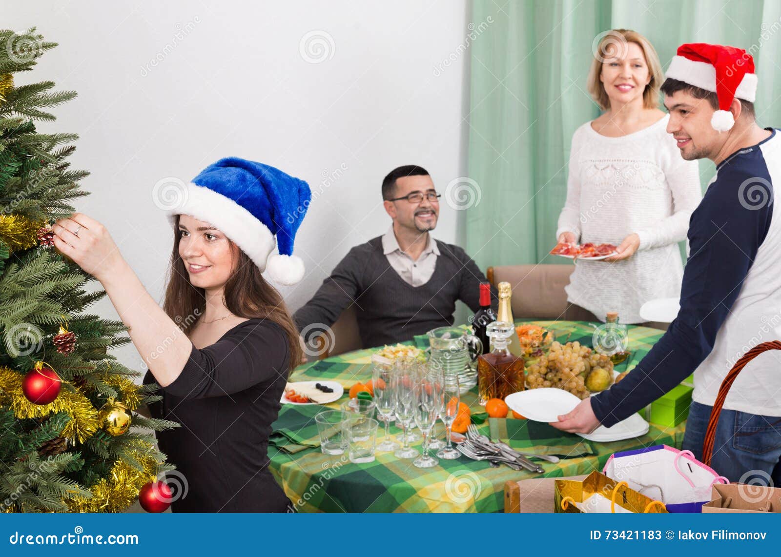 Cheerful Positive Smiling Family Setting Table for Dinner Stock Image ...