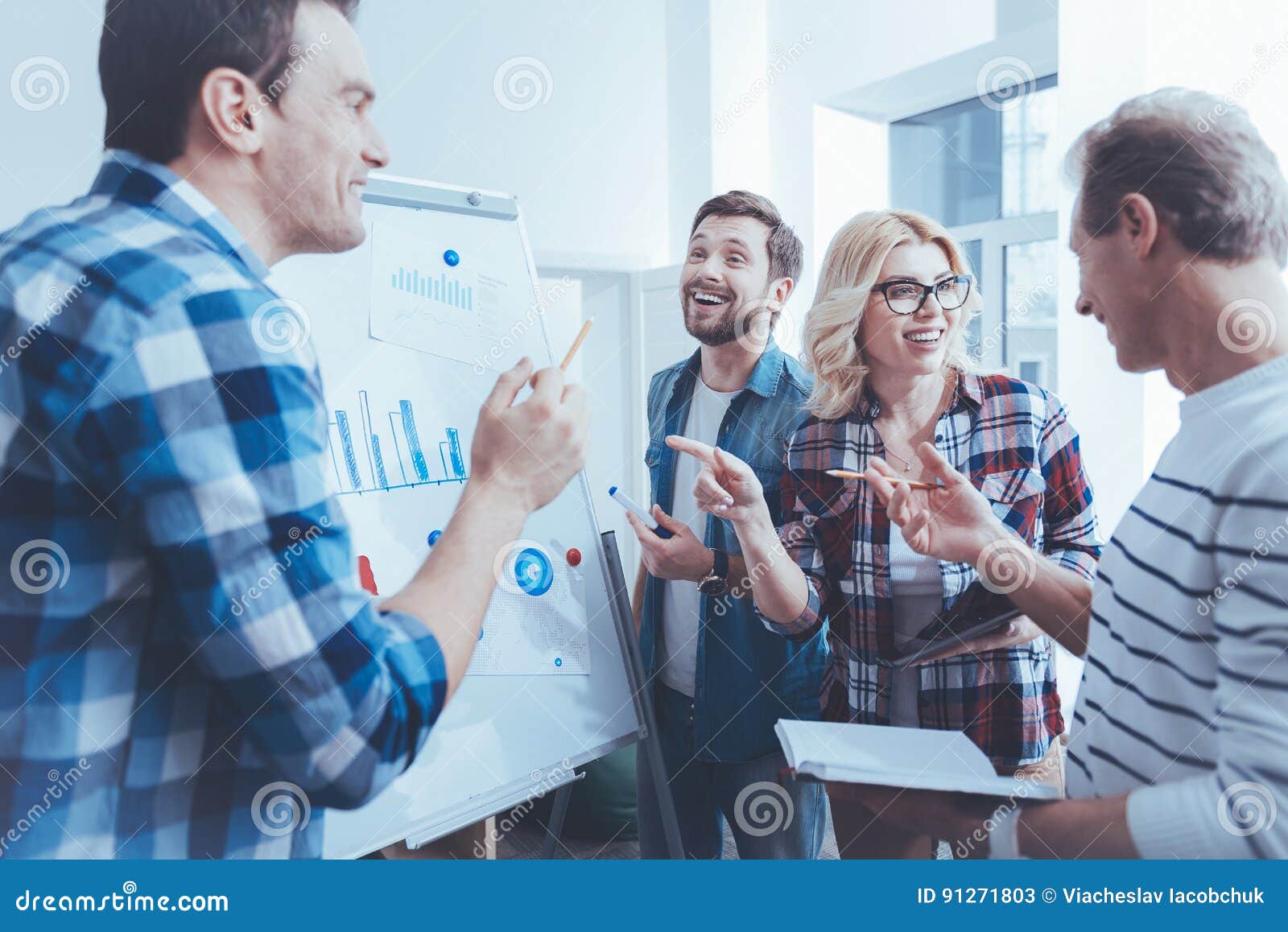 Cheerful Professional Group of Office Workers Discussing Project Stock ...