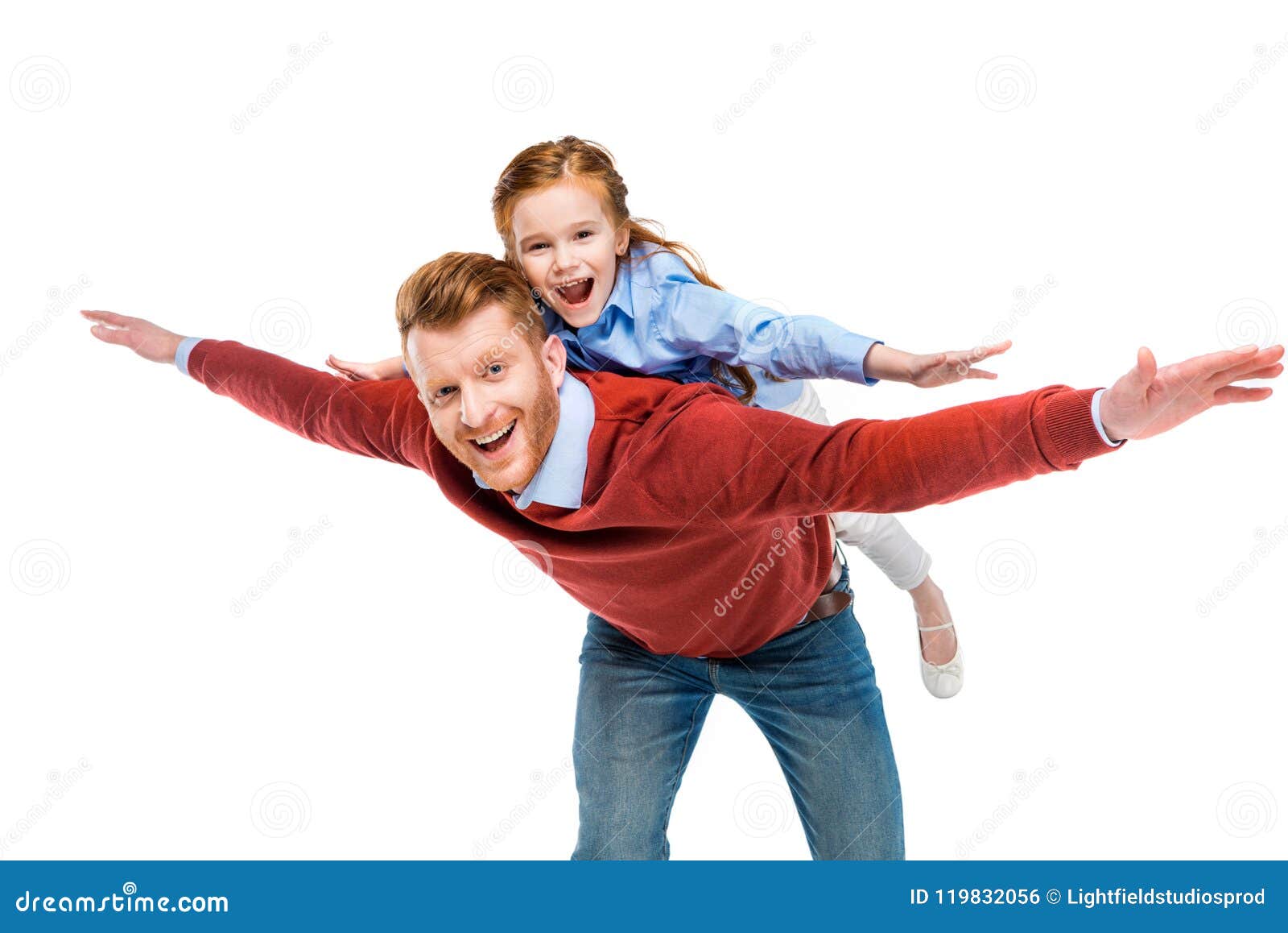 Cheerful Redhead Father And Daughter Having Fun Together And Smiling At