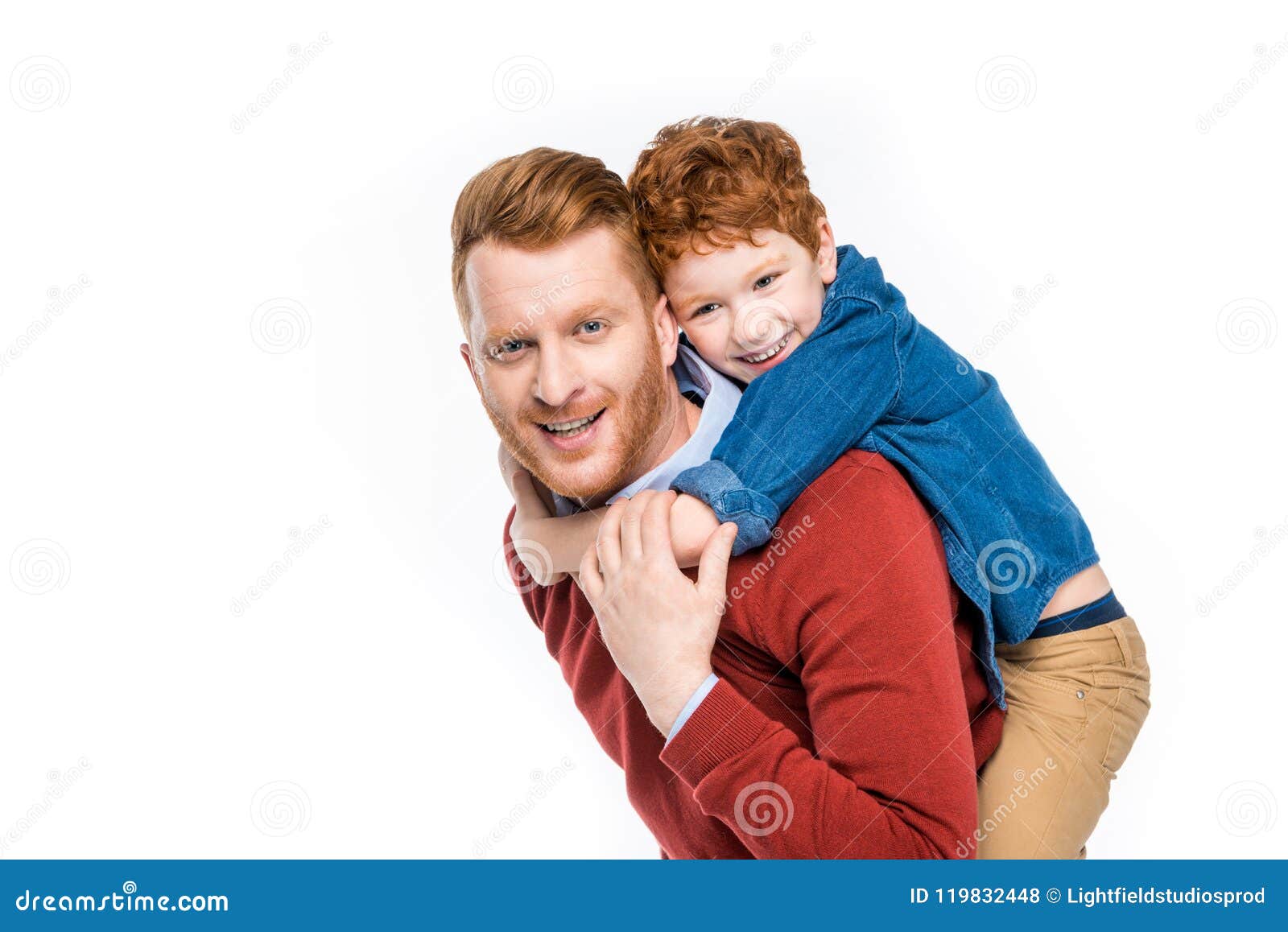 Cheerful Redhead Father And Son Hugging And Smiling At Camera Stock