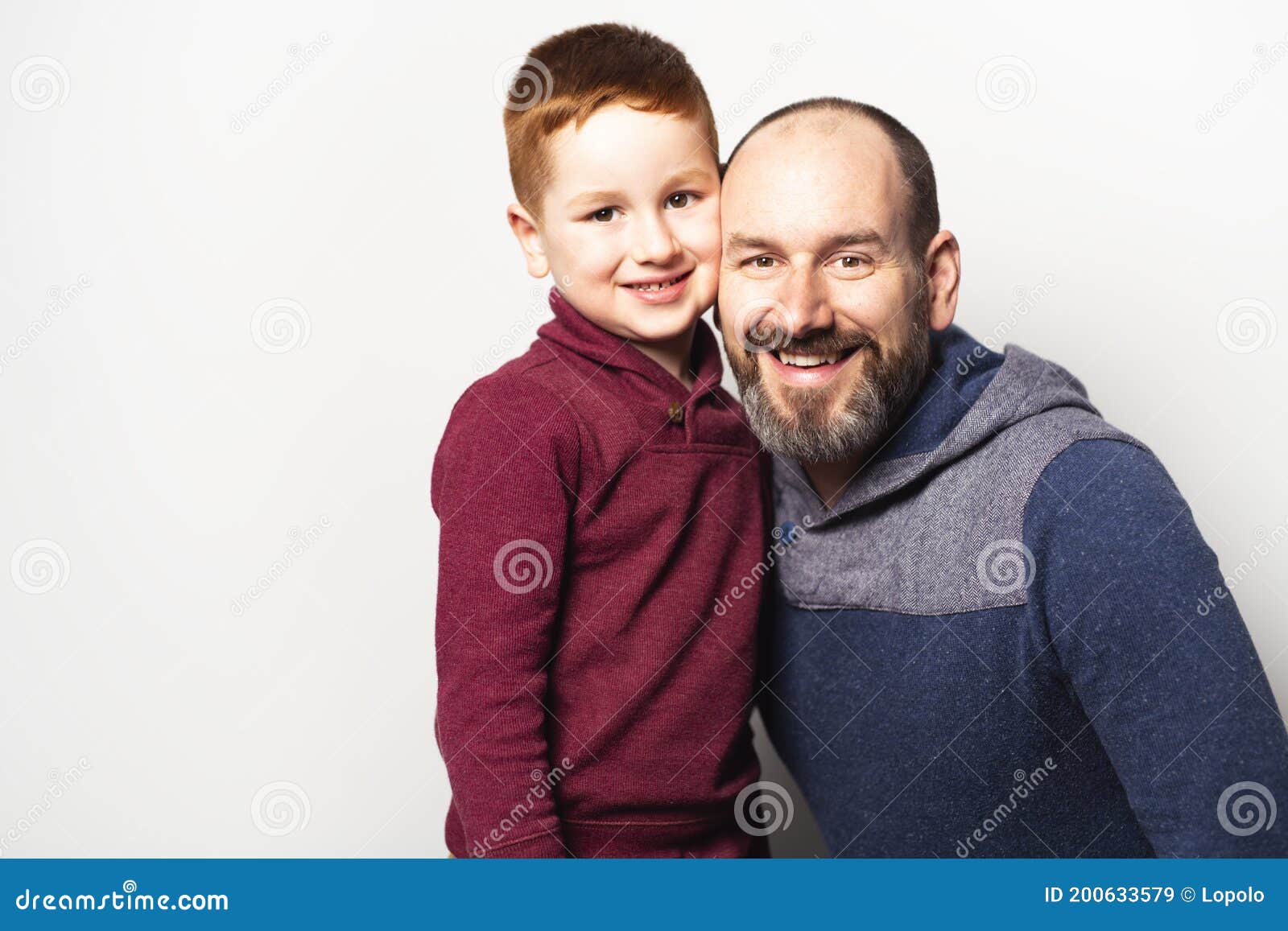 Cheerful Redhead Father and Son and Smiling at Camera Isolated on White ...