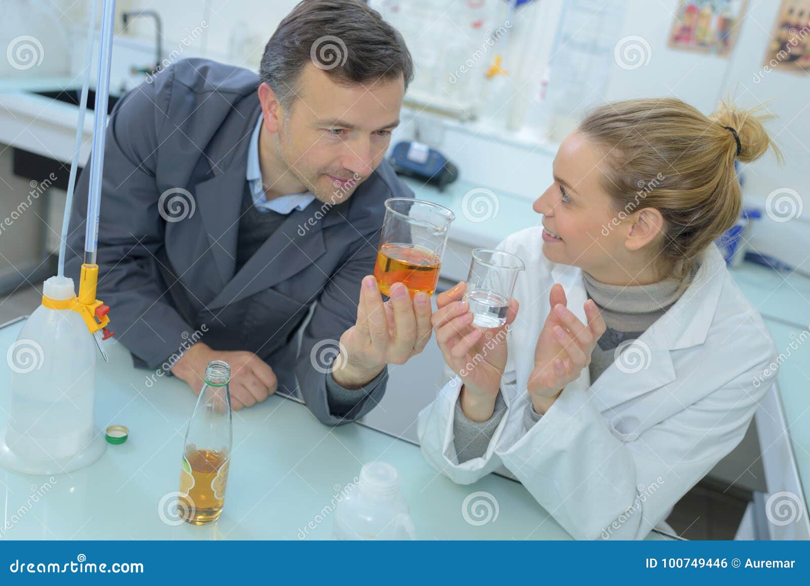 Cheerful Researchers Talking about Experiment Stock Photo - Image of ...