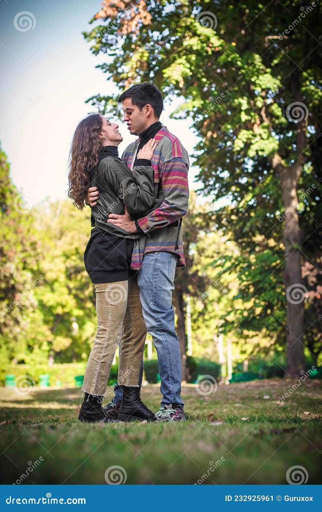 Cheerful And Romantic Couple Hugging And Enjoying In In Love Stock