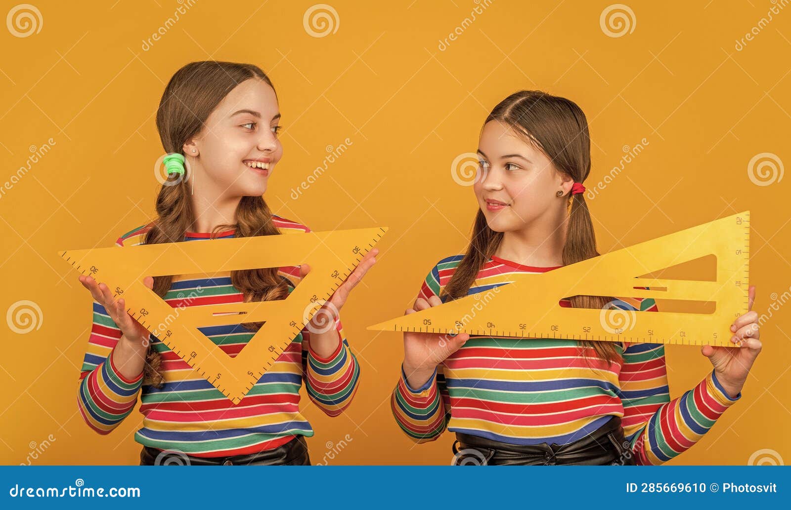 Cheerful School Kids Hold Math Tool of Triangle Stock Photo - Image of ...