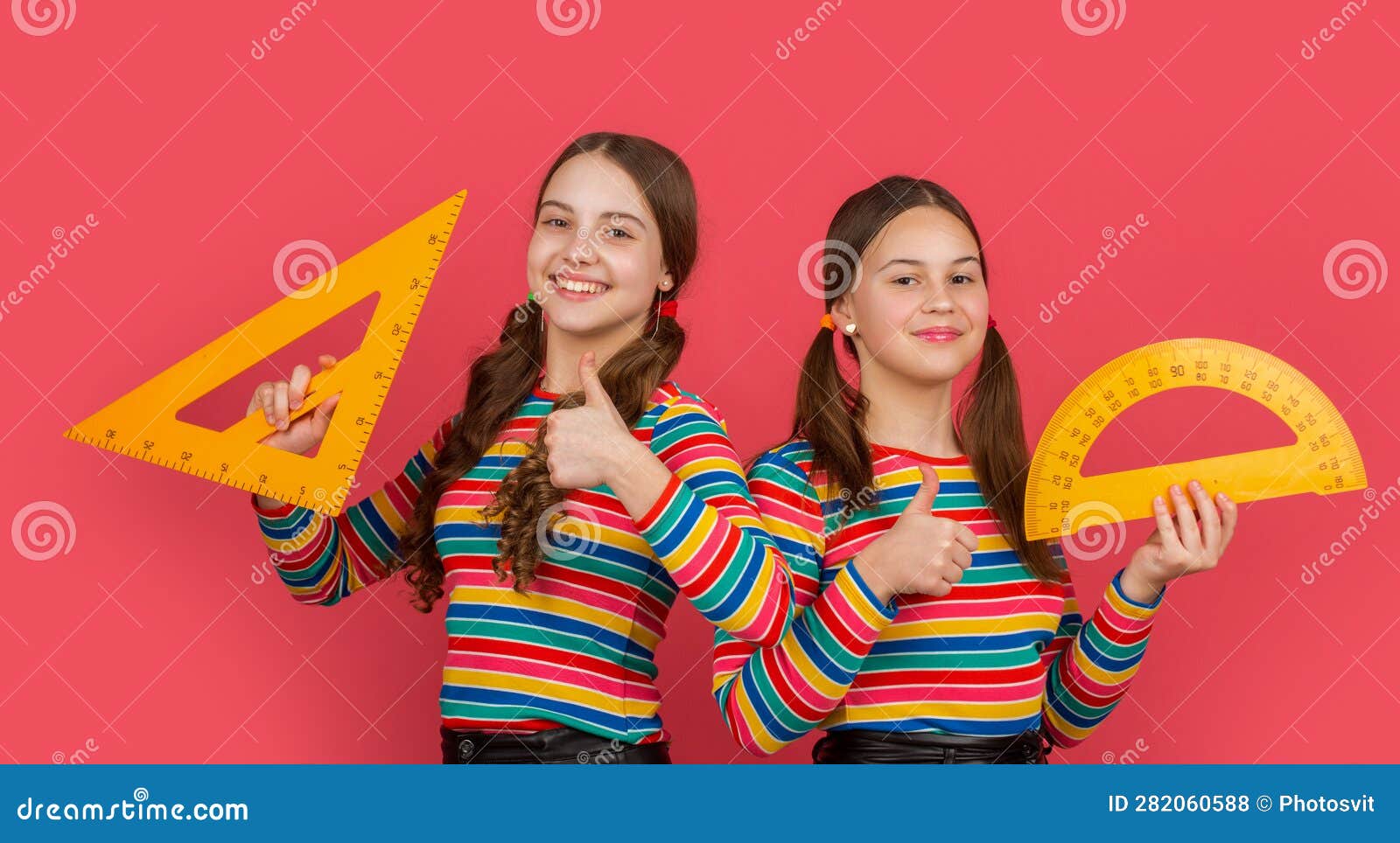 Cheerful School Students Hold Math Tool of Triangle and Protractor ...