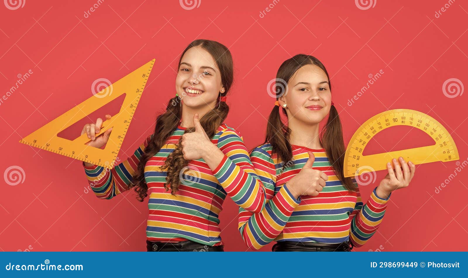 Cheerful School Students Hold Math Tool of Triangle and Protractor ...
