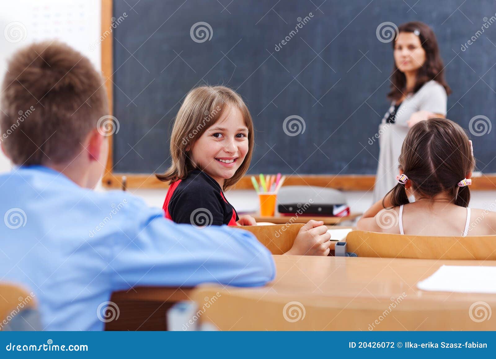 Cheerful Schoolgirl in Class Room Stock Photo - Image of school ...