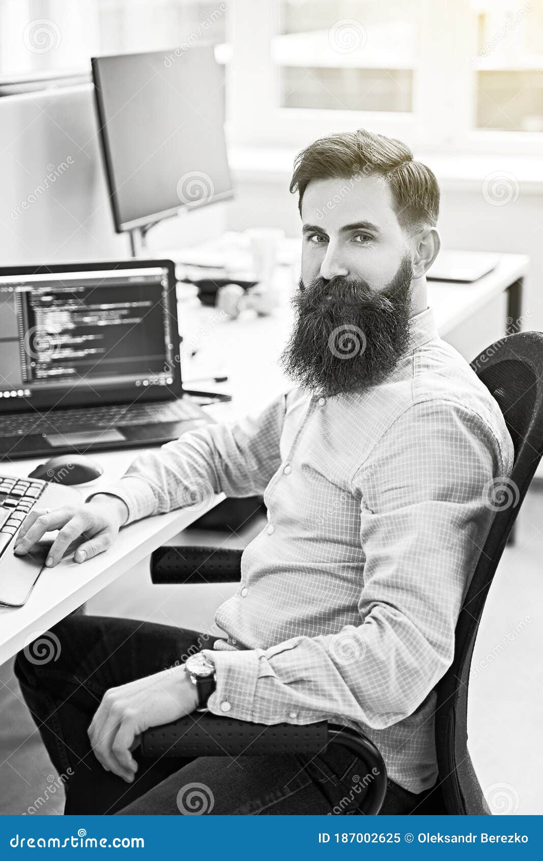Cheerful Senior Programmer Developer Working in it Office, Sitting at ...