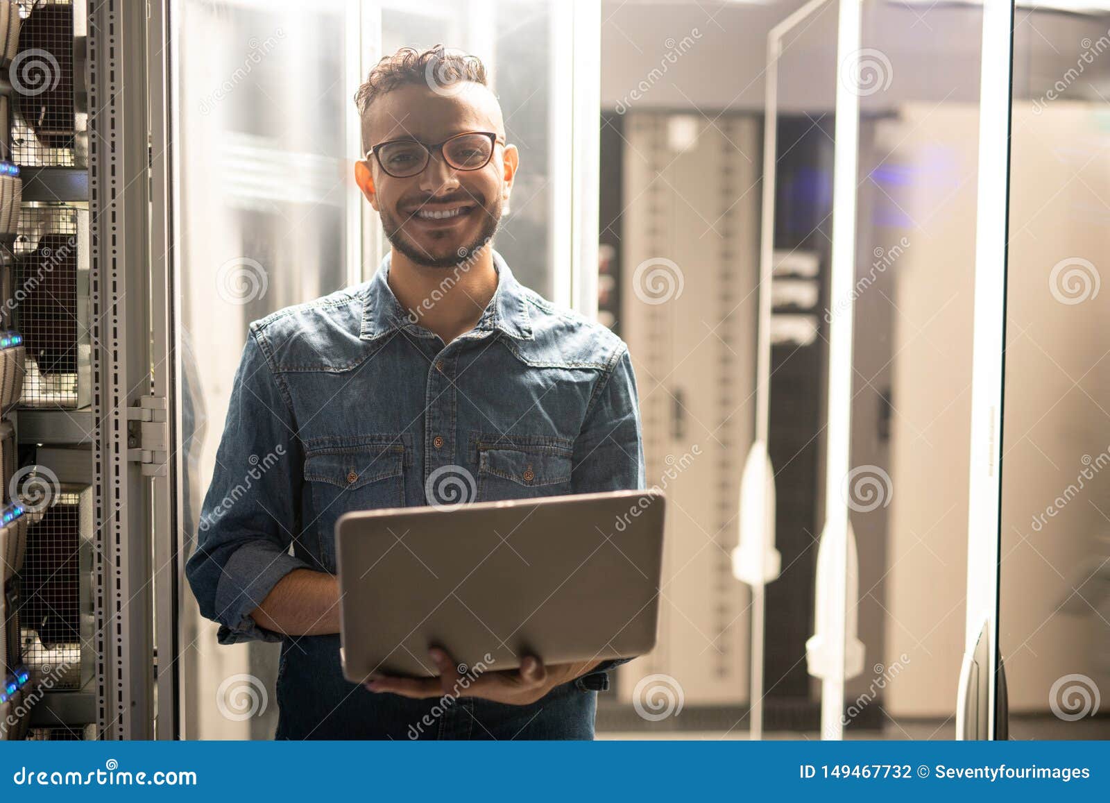Cheerful Server Engineer in Datacenter Room Stock Photo - Image of ...
