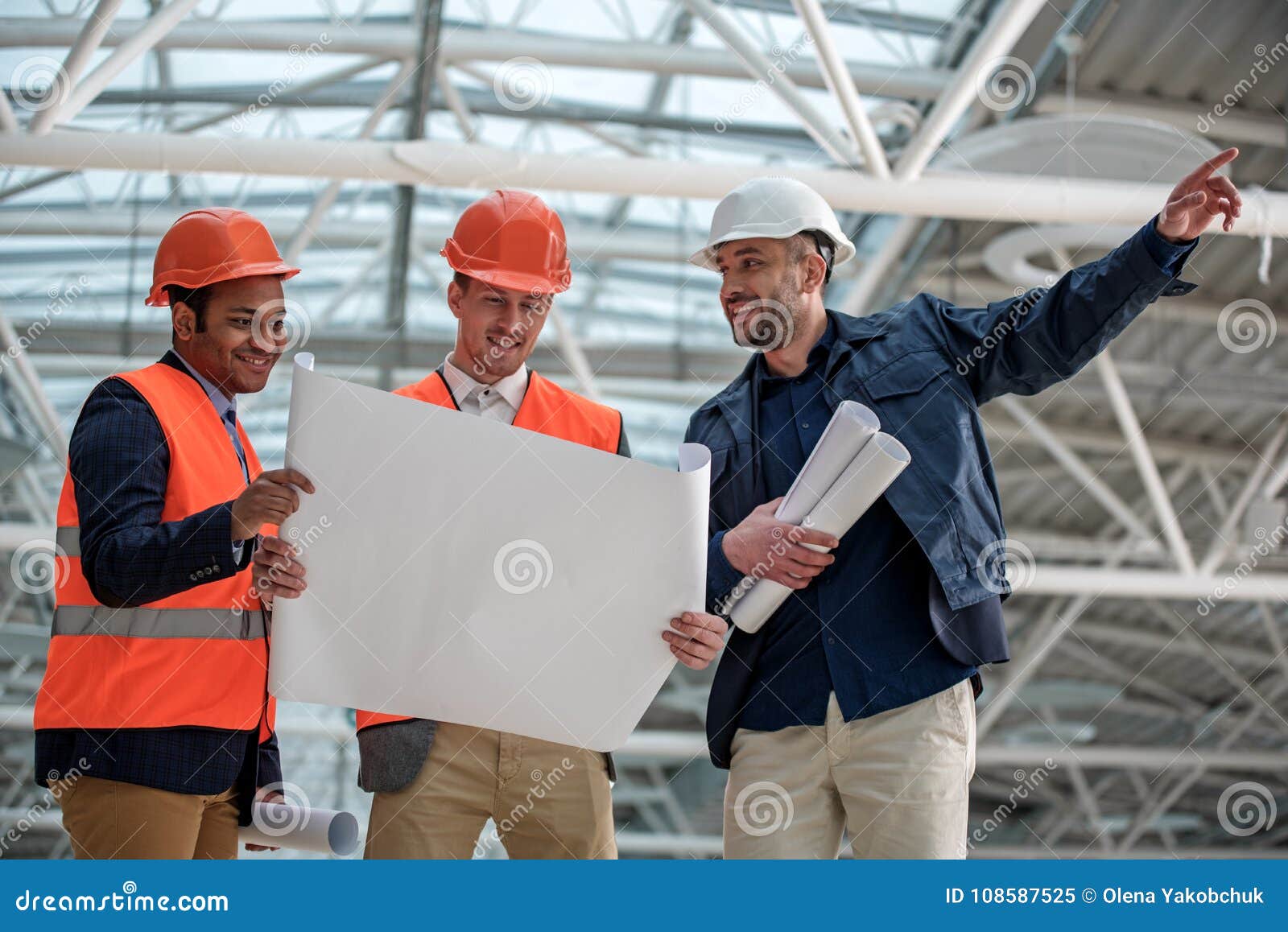 Cheerful Skilled Three Builders are Planning New Project Stock Image ...