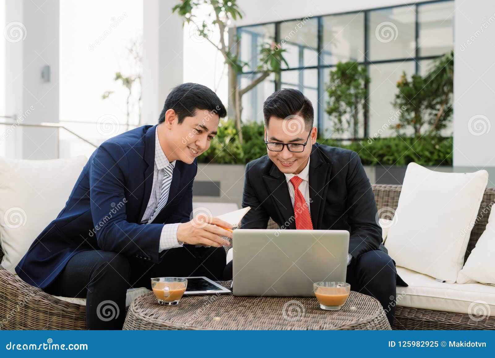 Cheerful Smart Businessmen Discussing Their Project Stock Image - Image ...