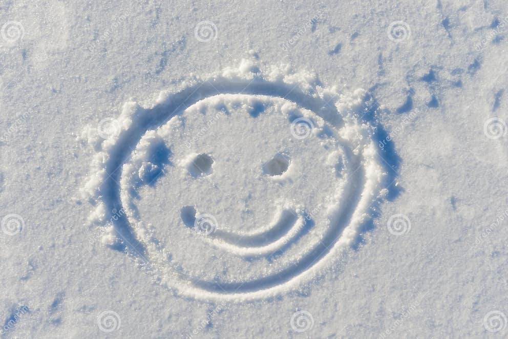 Cheerful Smiley Face on Snow Stock Image - Image of human, humor: 52682499