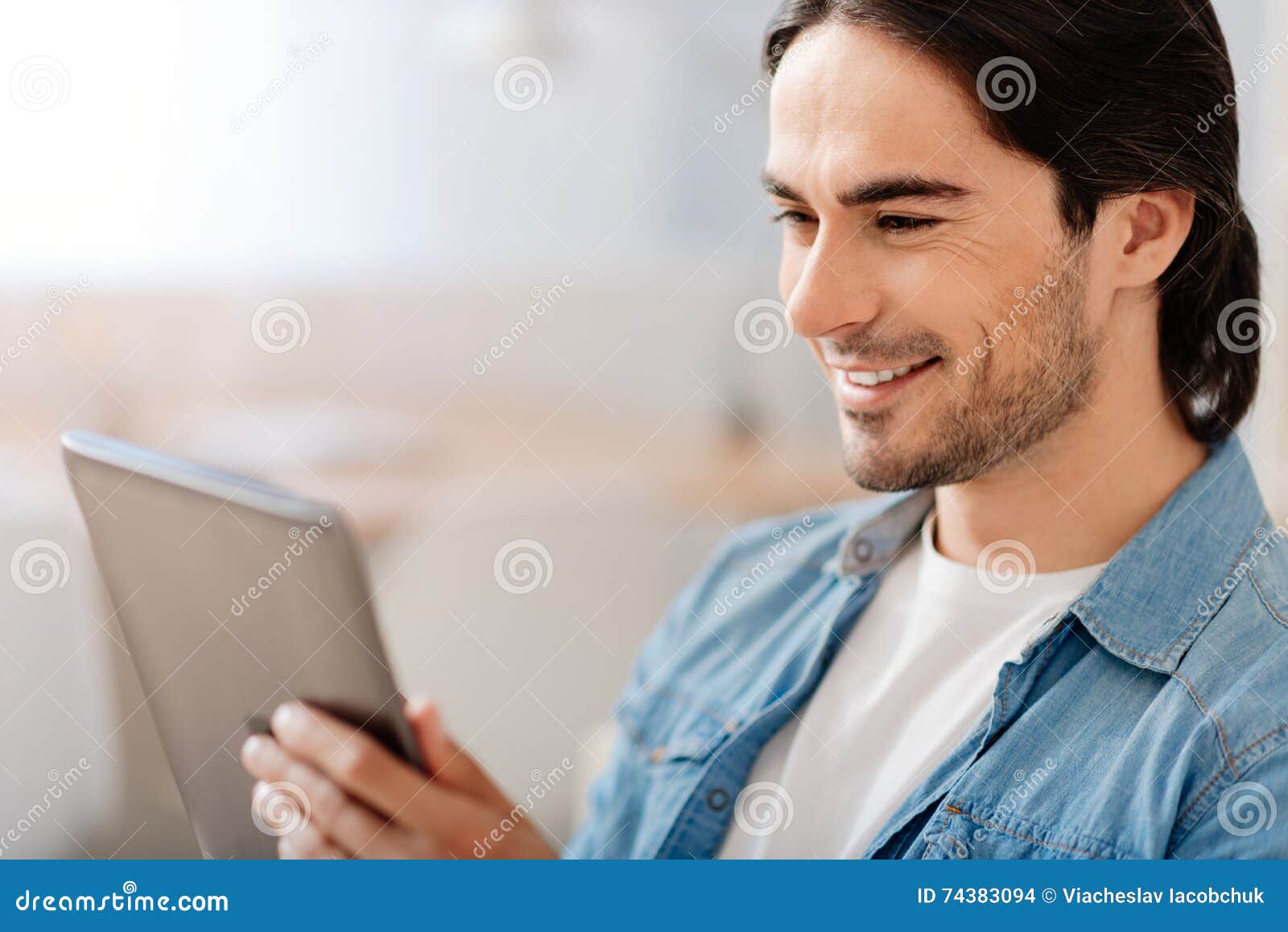 Cheerful Smiling Man Using Tablet Stock Photo - Image of hands ...