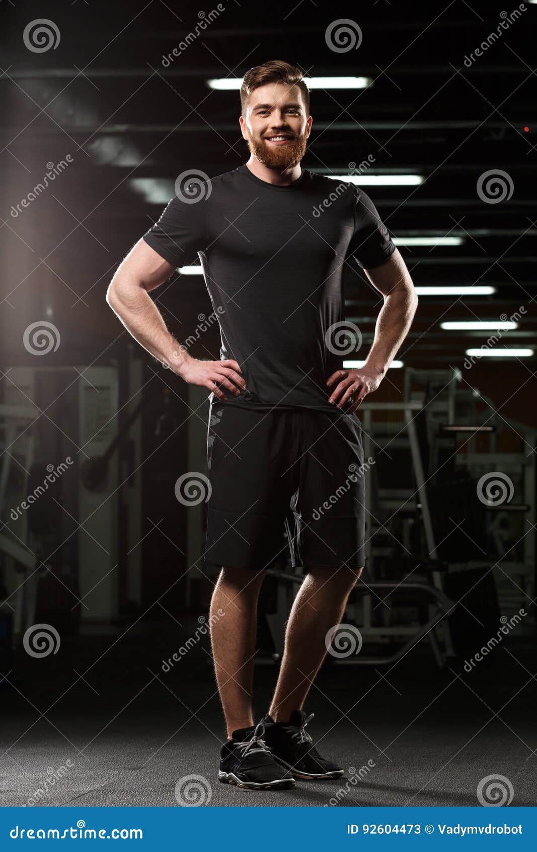 Cheerful Sports Man Standing and Posing in Gym Stock Image - Image of ...