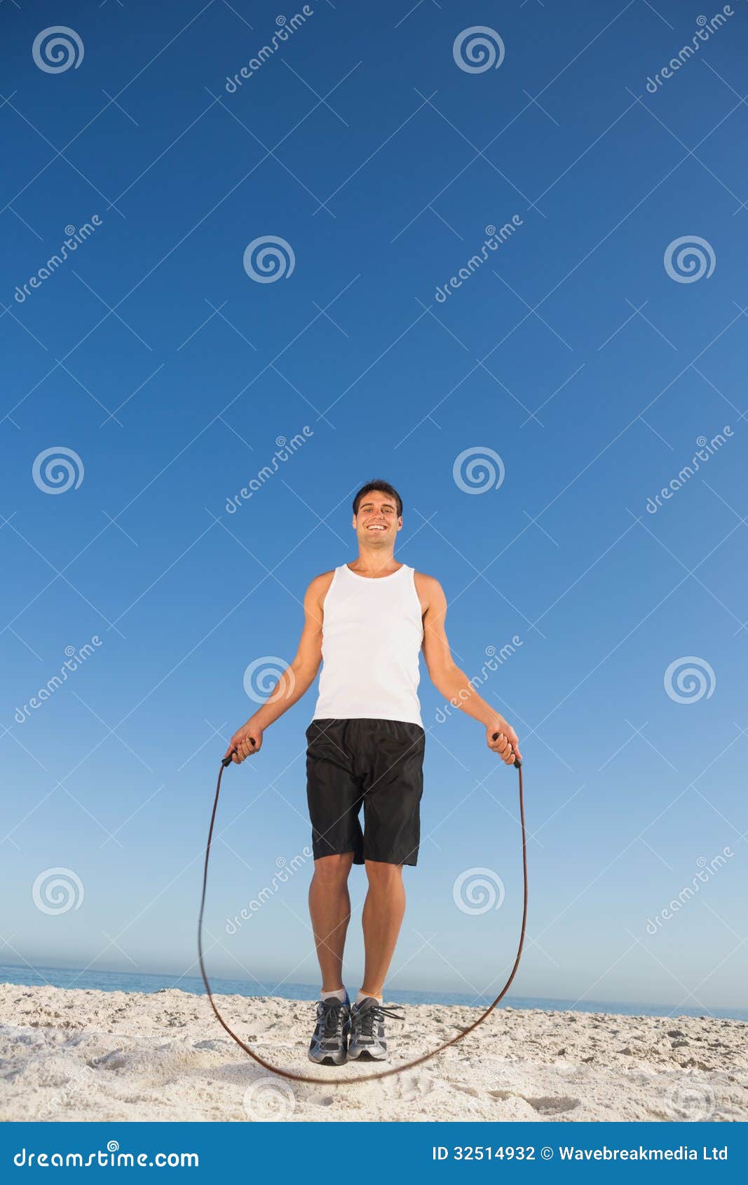 Cheerful Sporty Man Jumping Rope Stock Photo - Image of looking, jump ...