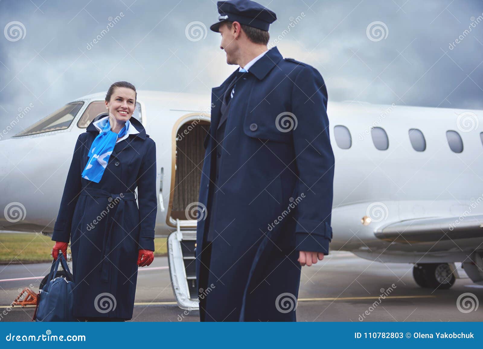 Cheerful Stewardess Speaking with Aviator Stock Image - Image of girl ...