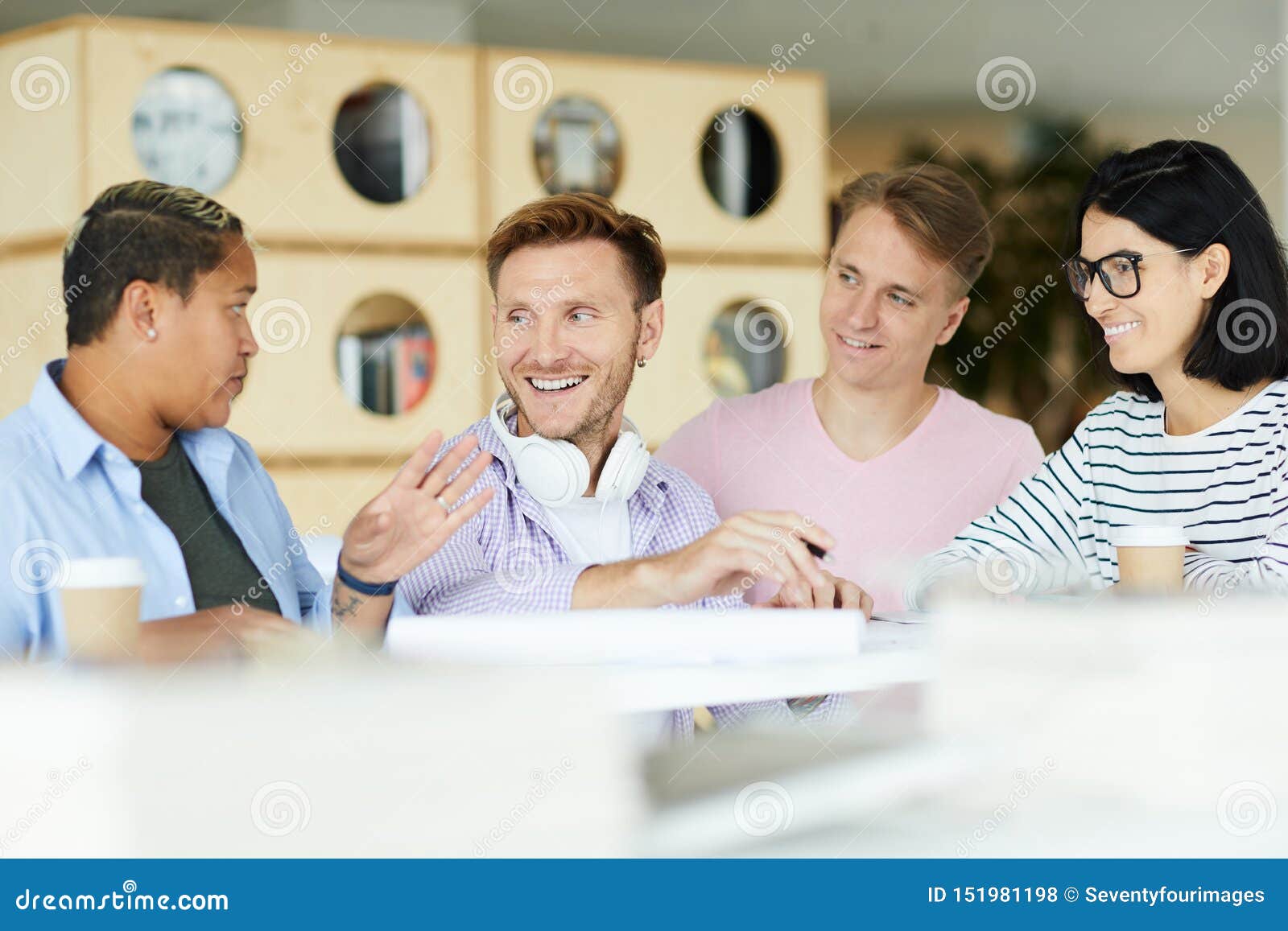 Cheerful Students Exchanging Ideas Stock Photo - Image of university ...