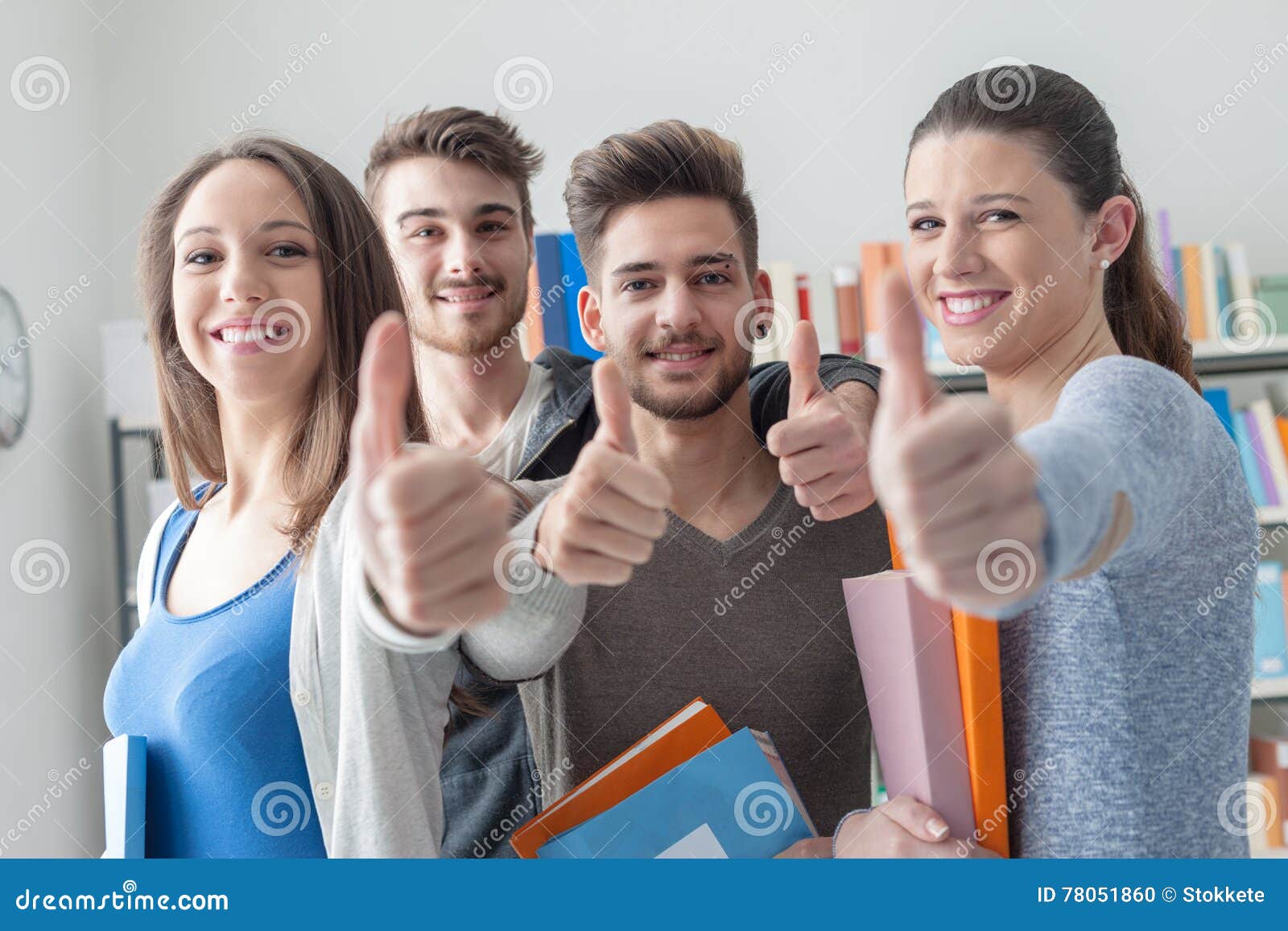 Cheerful Students with Thumbs Up Stock Photo - Image of team, graduate ...