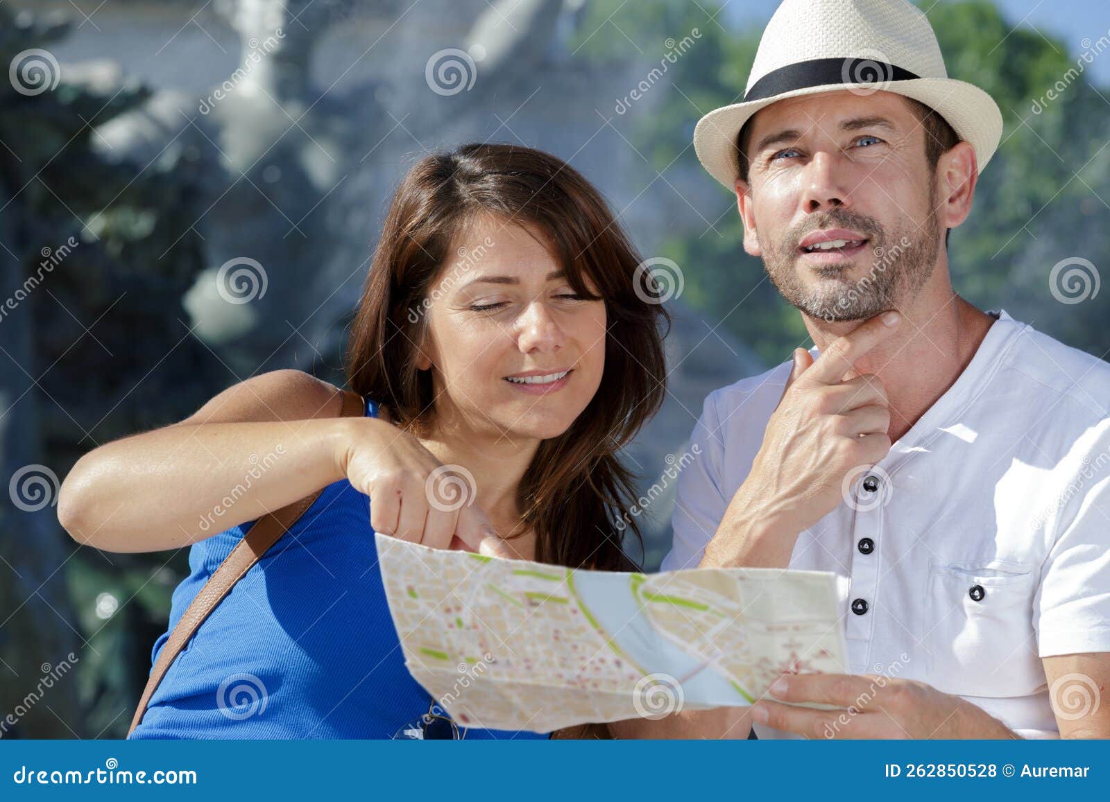 Cheerful Stylish Couple Looking at Maps Outdoors Stock Photo - Image of ...