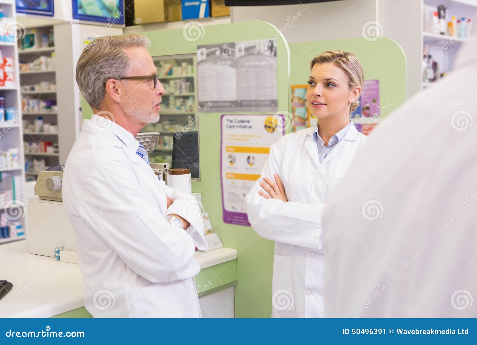Cheerful Team of Pharmacist Talking Together Stock Image - Image of ...
