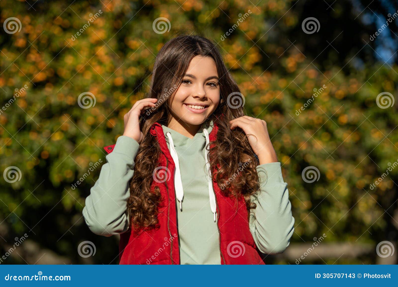 Cheerful Teen Girl Portrait Outdoor. Curly Teen Girl Portrait Outside ... Cheerful Teen Girl Portrait Outdoor. Curly Teen Girl Portrait Outside ...