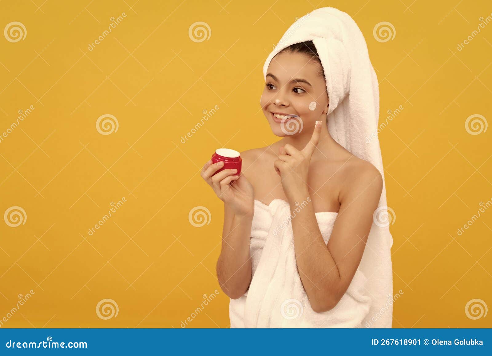 Cheerful Teen Girl In Shower Towel Apply Facial Cream Stock Image