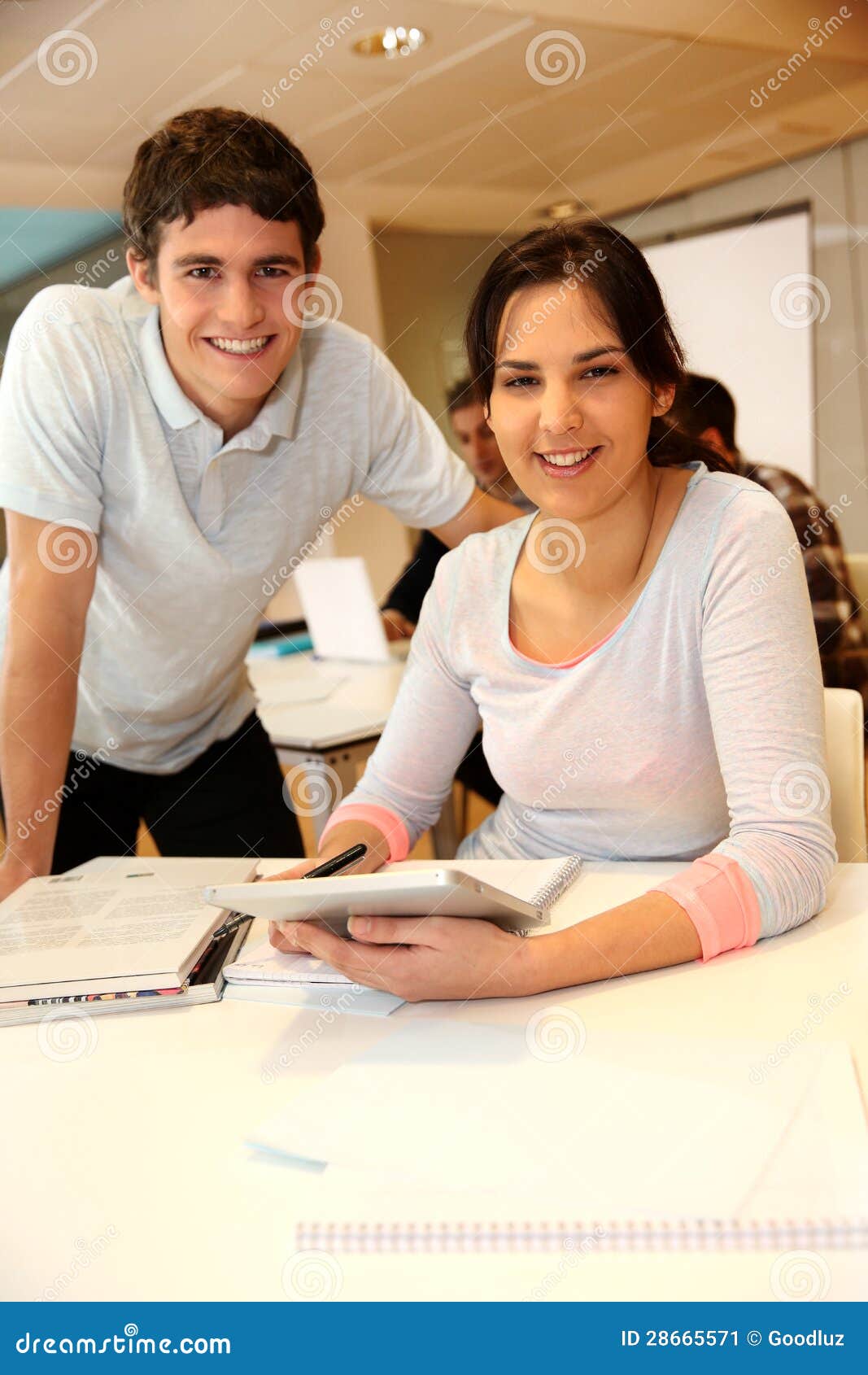 Cheerful Teens in Classroom Stock Image - Image of friends, happy: 28665571