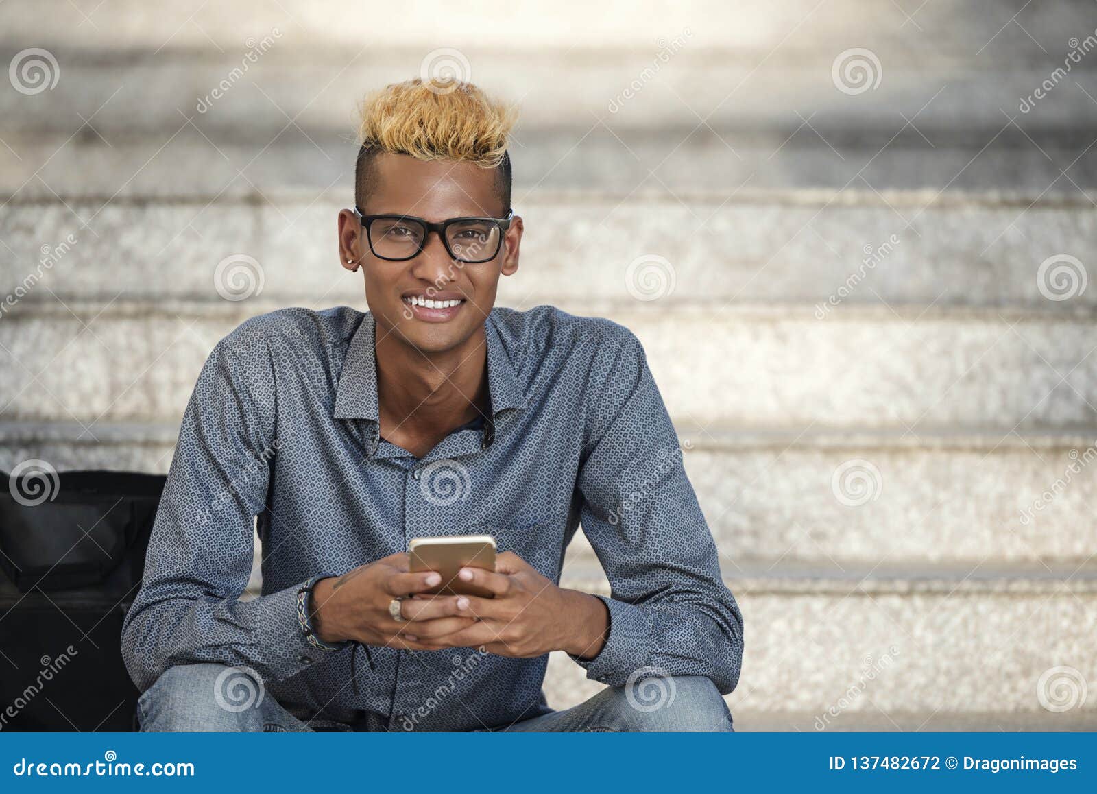 Cheerful texting man stock photo. Image of software - 137482672