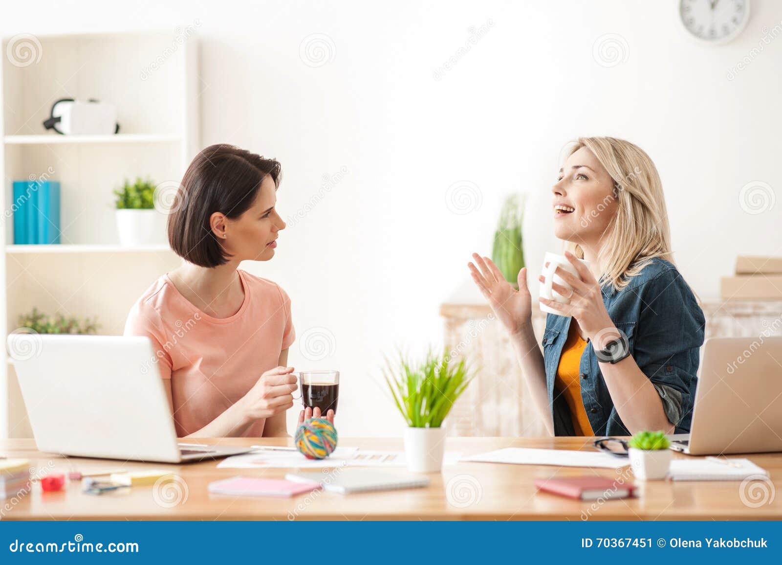 Cheerful Two Female Colleagues are Talking at Work Stock Image - Image ... Cheerful Two Female Colleagues are Talking at Work Stock Image - Image ...