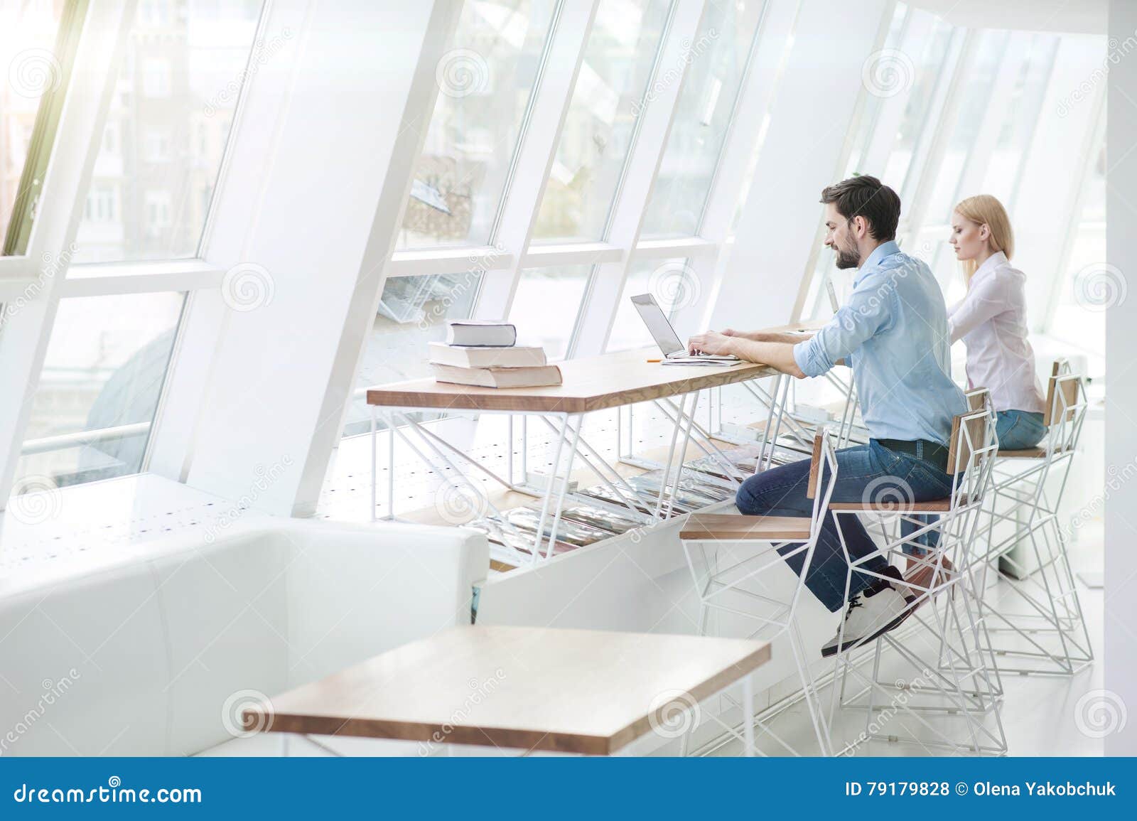 Cheerful Two Students are Studying with Computers Stock Photo - Image ...