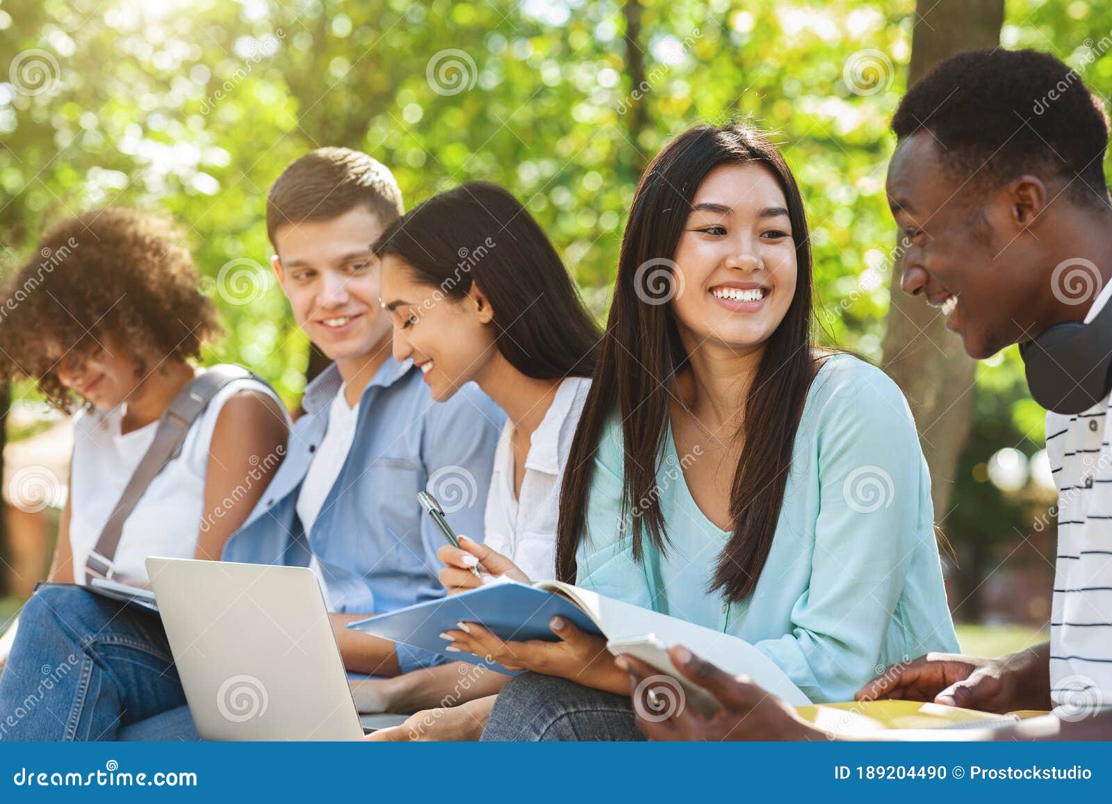 Cheerful University Friends Resting Beetween Classes Outdoors, Chatting ...