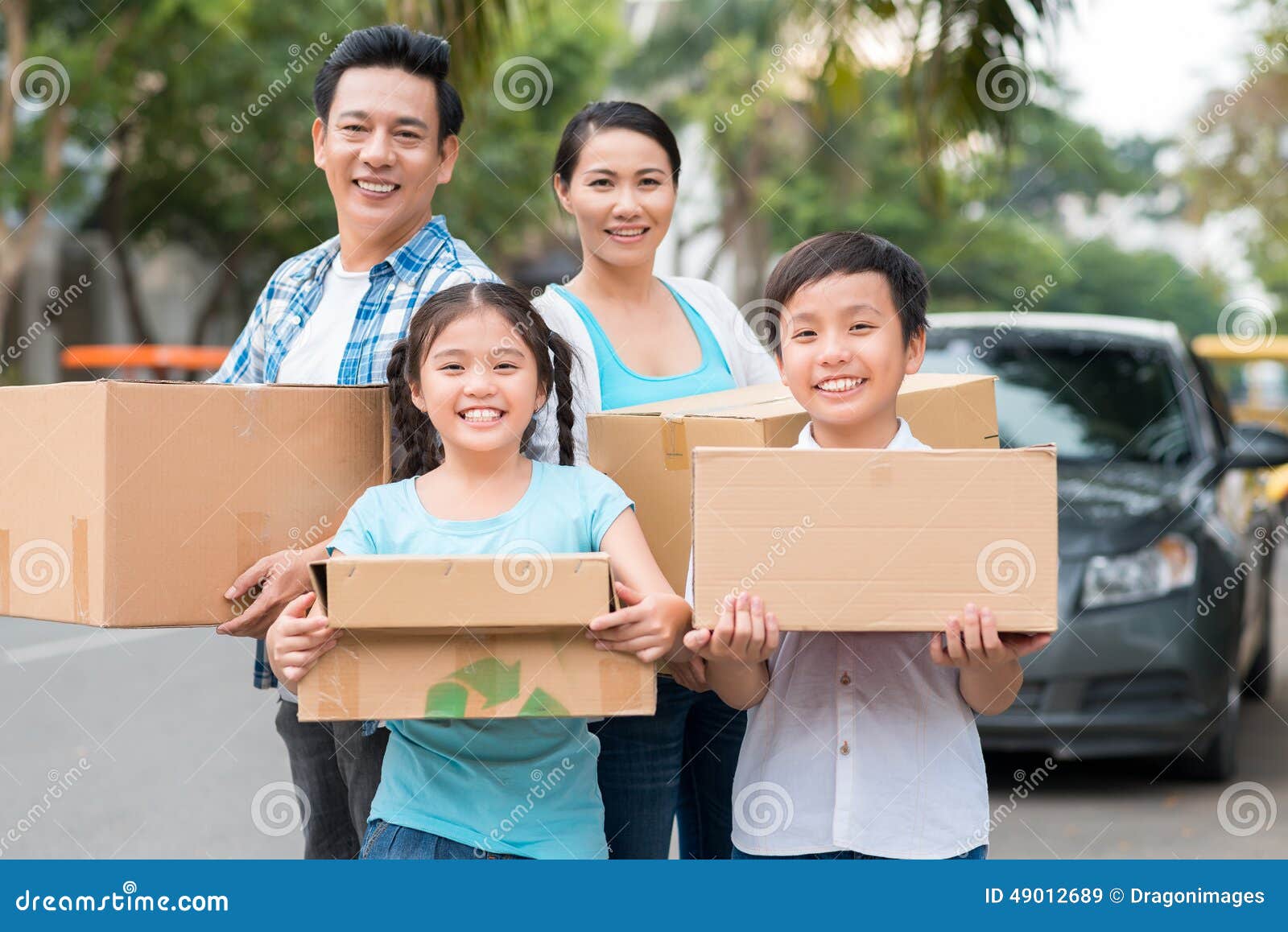 Cheerful Vietnamese family stock image. Image of donation - 49012689