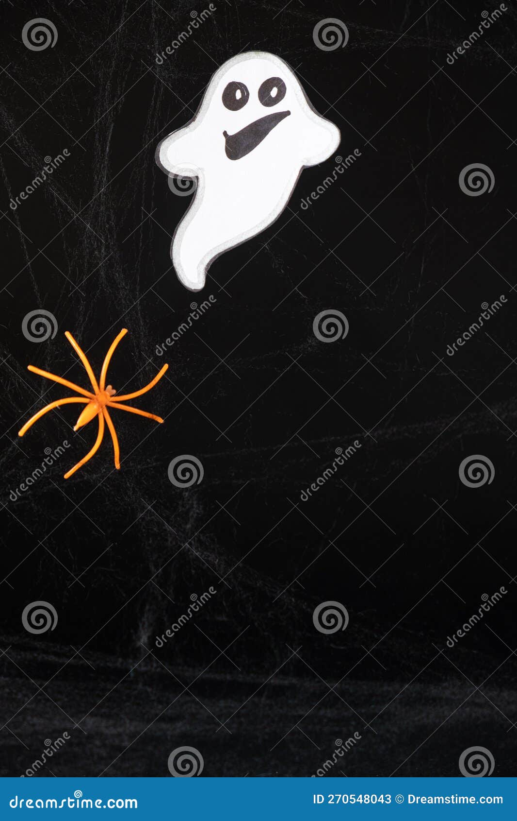 A Cheerful White Ghost with a Face Smiles and Flies on a Black ...