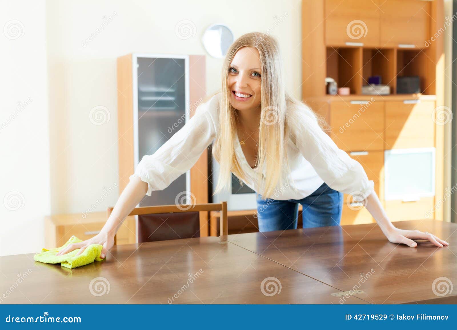 Cheerful Woman Cleaning Table at Home Stock Image - Image of home ...