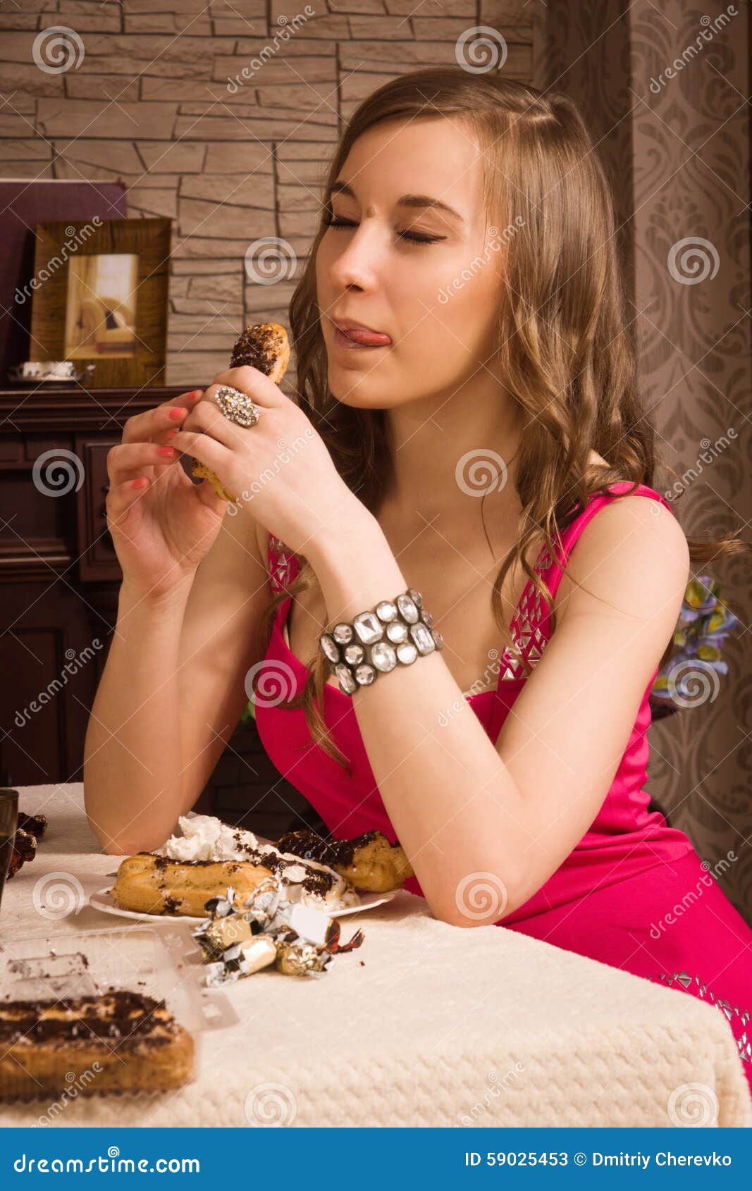 Cheerful woman eating pie stock image. Image of background - 59025453