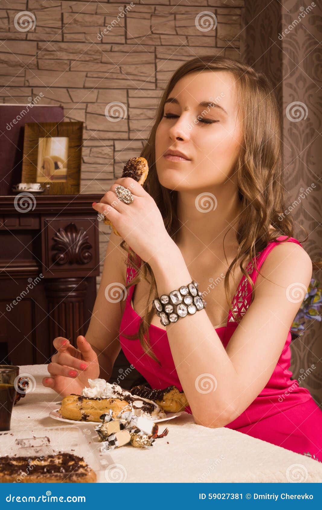 Cheerful woman eating pie stock image. Image of attractive - 59027381