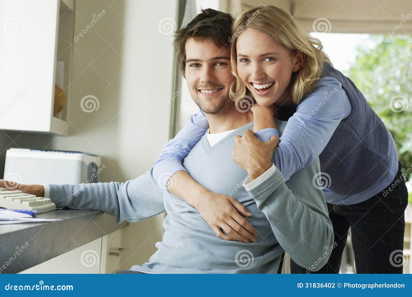 Cheerful Woman Hugging Man from Behind Stock Photo - Image of enjoyment ... Cheerful Woman Hugging Man from Behind Stock Photo - Image of enjoyment ...