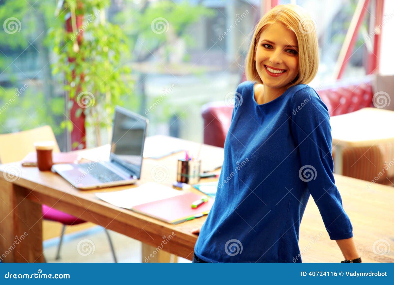 Cheerful Woman Leaning at the Table Stock Photo - Image of joyful ...