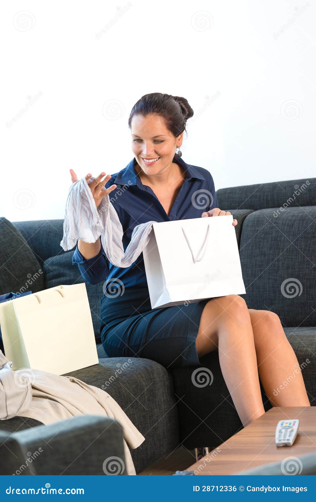 Cheerful Woman Looking Clothes Gift Present Home Stock Photo - Image of ...